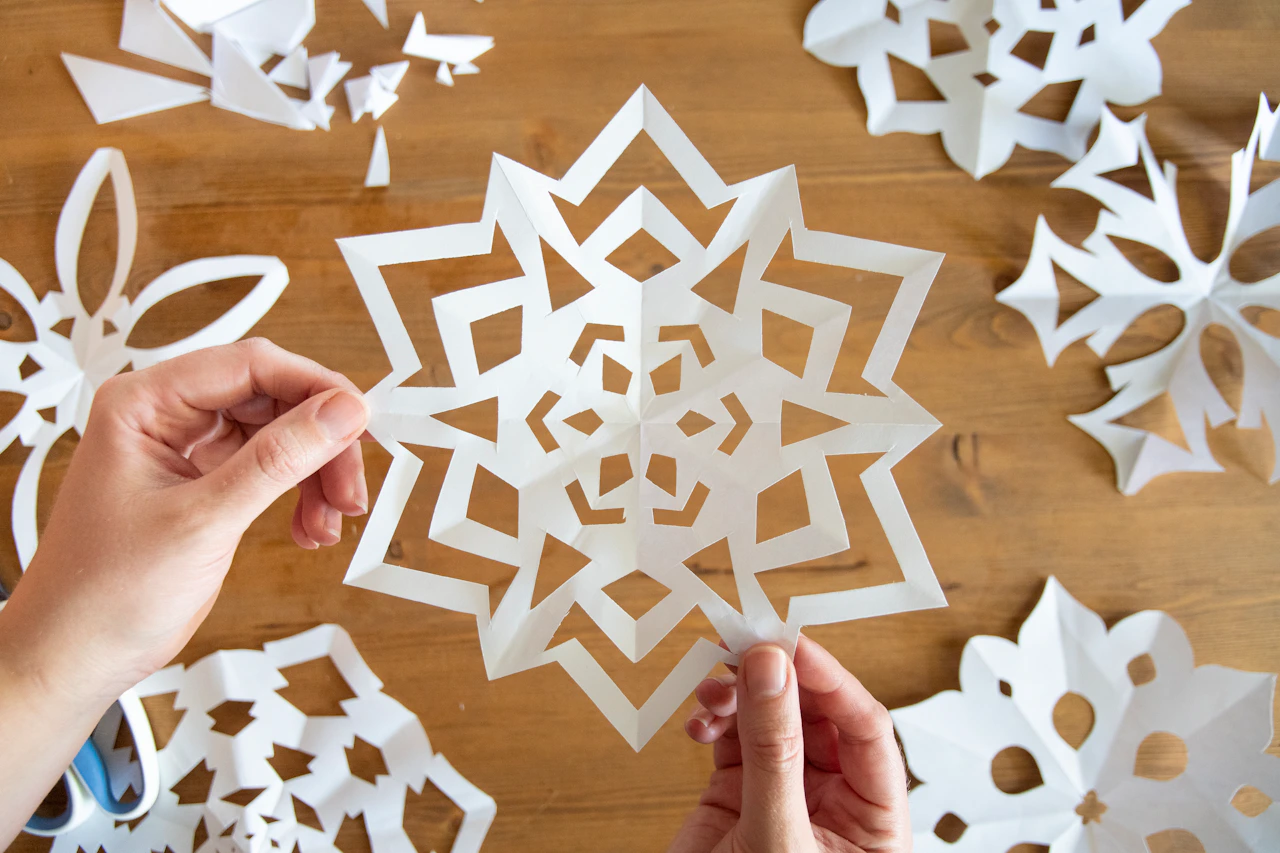 How to Make Paper Snowflakes For Winter Decorating - The Krazy Coupon Lady